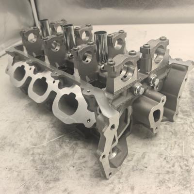 China Chevrolet Onix 1.0T Cylinder Head Left 24112800 24109539 OEM Replacement for Tracker 12V Engine for sale
