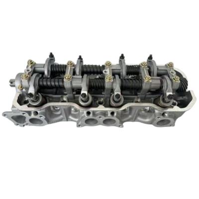 China Isuzu 4ZD1 2.3L Engine Complete Cylinder Head Iron Heart-Shaped Chamber 8973583660 for sale