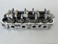 China Isuzu 4ZD1 2.3L Engine Complete Cylinder Head Iron Heart-Shaped Chamber 8973583660 for sale