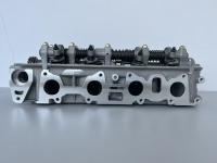 China Isuzu 4ZD1 2.3L Engine Complete Cylinder Head Iron Heart-Shaped Chamber 8973583660 for sale