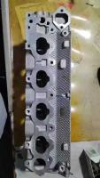 China 4G93 4G93K Cylinder Head MD320808 MD311423 New Iron Aluminum Engine Part for Mitsubishi for sale
