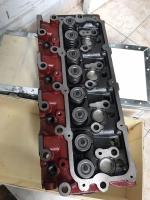 China KIA K3000 J2 JT Cylinder Head OK75A-10100 Bare Engine Cylinder Head Iron Aluminum Standard Size for sale