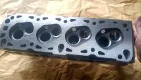 China EQ491 OHC Cylinder Head SE000258 for Ford Taunus 1993cc 2.0L Iron Aluminum for sale