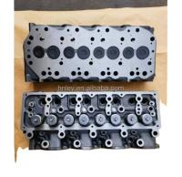 China Complete Cylinder Head TD27 for Nissan Terrano 2.7TD AMC 909111 909112 for sale