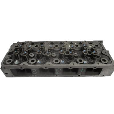 China Kubota V2607T V2607DI Complete Cylinder Head 4 Cylinder Diesel Engine Part for sale