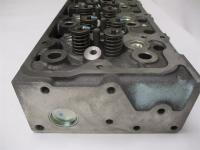 China Kubota V2607T V2607DI Complete Cylinder Head 4 Cylinder Diesel Engine Part for sale