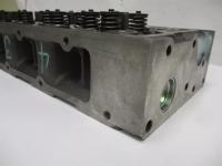 China Kubota V2607T V2607DI Complete Cylinder Head 4 Cylinder Diesel Engine Part for sale