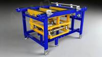 China Heavy-Duty PLC Controlled Stainless Steel Pallet Conveyor System for Automated Pallet Handling for sale
