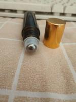 China 5ml 10ml 15ml 30ml Amber glass Roll on bottle with steel roller and gold aluminum cap for sale