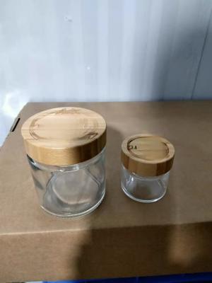 China 2oz 9oz clear glass jar with Common screw bamboo cap and cap Laser -engraved  logo for sale