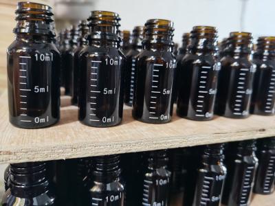 China Precision Measured Essential Oil Bottles: Amber, Clear & Transparent Frosted Glass Vials with Accurate Scale Lines for sale