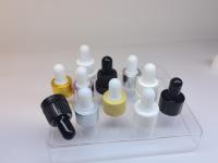China Premium Customizable Glass Essential Oil Bottles | 5ml-100ml Dropper Bottles with Multi-Material Caps & Scale Options for sale