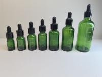 China Premium Customizable Glass Essential Oil Bottles | 5ml-100ml Dropper Bottles with Multi-Material Caps & Scale Options for sale