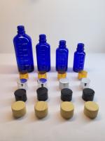 China Premium Customizable Glass Essential Oil Bottles | 5ml-100ml Dropper Bottles with Multi-Material Caps & Scale Options for sale