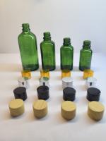 China Premium Customizable Glass Essential Oil Bottles | 5ml-100ml Dropper Bottles with Multi-Material Caps & Scale Options for sale