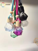 China Empty Hanging Glass Car Air Freshener Empty Bottles Wholesale | 5ml 8ml 10ml Car Diffuser Bottle with Bamboo Wooden Cap for sale