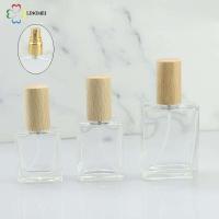 China Wholesale Flat Square Glass Perfume Atomizer Bottles | 10ml, 15ml, 30ml Empty Refillable Spray Bottles with Metallic Aluminum& Wooden Caps for sale