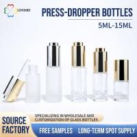 China Luxury Push-Button Dropper Glass Bottle 5ml 10ml 15ml for Essential Oils & Cosmetic Serums for sale