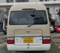 China Toyota Coaster 20-23 Seater Gasoline Tour Bus with 151kW Engine and 7005mm Length for Business Transport for sale