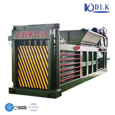 China Hydraulic Paper Baling Press with 50-100 Tons Compression Force 2200*1120*1300mm Feed Hopper and Semi-automatic Operation for sale