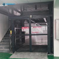 China 2 Ton Mezzanine Industrial Hydraulic Lift Multi Level Warehouse Goods Handling for sale