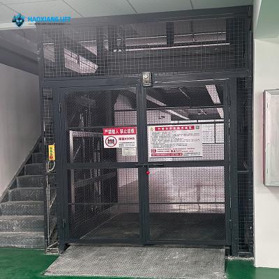 China 2 Ton Mezzanine Industrial Hydraulic Lift Multi Level Warehouse Goods Handling for sale