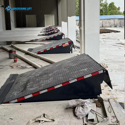 China Adjustable Hydraulic Fixed Dock Leveler Plate Stationary Elevator For Truck Container for sale