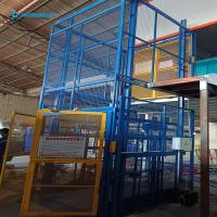 China 500kg - 20,000kg Hydraulic Guide Rail Lift Multi-story Warehouse Stock Movement for sale