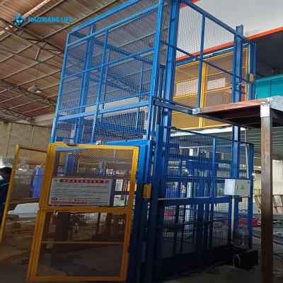 China 500kg - 20,000kg Hydraulic Guide Rail Lift Multi-story Warehouse Stock Movement for sale
