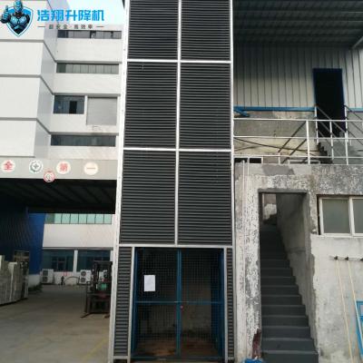 China Multi Story Mezzanine Industrial Hydraulic Lift 5T 10M For Warehouse Goods for sale