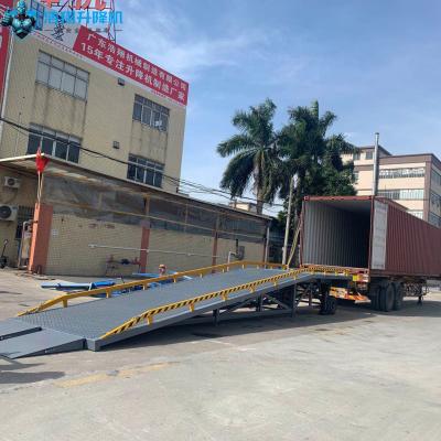 China Construction Forklift Portable Manual Movable Dock Ramp 10 Ton With Safety Guardrails for sale