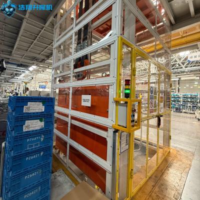 China Hydraulic Guide Rail Cargo Warehouse Goods Freight Lift Platform for sale