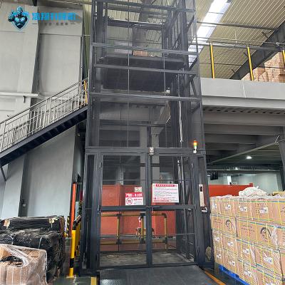 China 2000kg Vertical Hydraulic Guide Rail Cargo Lift Industrial Goods Elevator for sale