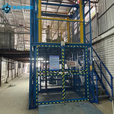 China 1500kg Hydraulic Cargo Lift with Safety System Warehouse Freight Elevator for sale