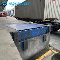 China Hydraulic Dock Ramp Gray - Adjustable Height 5T-18T - No Pit Needed for Warehouse Truck Container Handling for sale