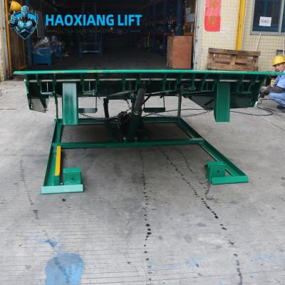 China Automatic Loading Bay Dock Leveller Steel Plate Lifter For Cargo Loading And Unloading Hydraulic Loading Dock for sale
