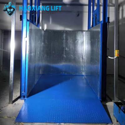 China Stainless Steel Electric Hydraulic Guide Rail Lift for Warehouse Cargo CE ISO Material lift Load platform for sale