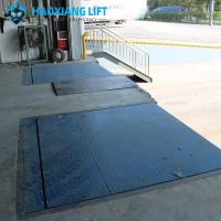 China Forklift-Compatible Hydraulic Stationary Dock Leveler - Strength Steel Platform Automatic Hydraulic System for Truck Container for sale
