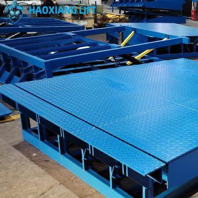 China Heavy-Duty 5T-18T Hydraulic Lift Platform - Adjustable Height & Slip-Resistant for Cargo Transfer for sale