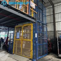 China Custom 2-Ton 6M Indoor Hydraulic Cargo Lift - Four-section Door & Rhombic Mesh Barrier for sale