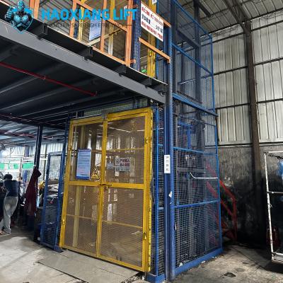 China Custom 2-Ton 6M Indoor Hydraulic Cargo Lift - Four-section Door & Rhombic Mesh Barrier for sale
