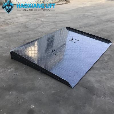 China Heavy-Duty Steel Shipping Container Ramp - 10 Ton Anti-Slip Forklift Loading Ramp for sale