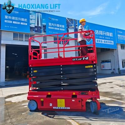 China Heavy-Duty Mobile Scissors Lift - 14m Working Height 600kg Industrial Construction Aerial Lift for sale