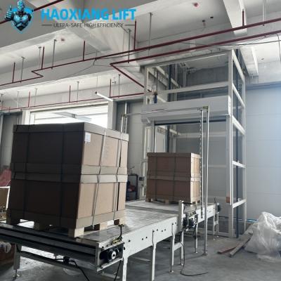 China HAOXIANG Heavy-Duty Vertical Reciprocating Conveyor - 5M 500-3000kg Customizable Hydraulic Factory Material Lift for sale