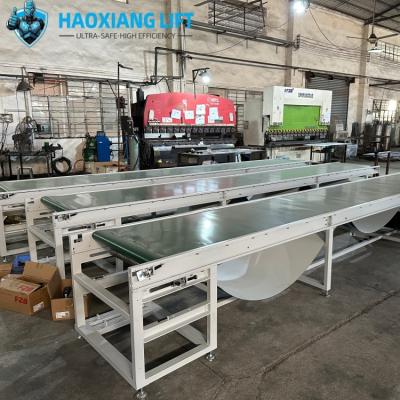 China High-Efficiency Continuous Chain Conveyor - 1100kg HAOXIANG E-Commerce Fulfillment Center Conveyor for sale