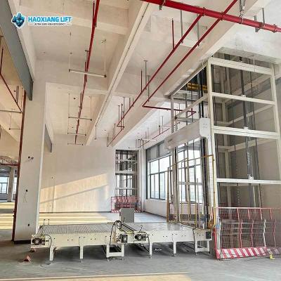 China Industrial Vertical Reciprocating Conveyor Space Saving Pallet Lift System for sale