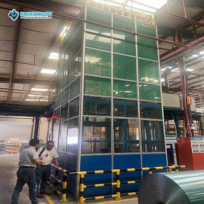China Automatic Vertical Reciprocating Conveyor PLC Controlled Pallet Elevator for sale