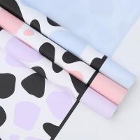 China Giraffe Floral Packaging Paper Waterproof Plastics Gravure Printing Wax Specialty Paper for sale