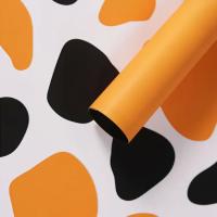 China Giraffe Floral Packaging Paper Waterproof Plastics Gravure Printing Wax Specialty Paper for sale