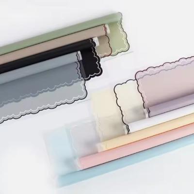 China Frosted Flower Wrapping Paper With Wavy Lines Gift Packaging Waterproof Gift Wrapper for sale